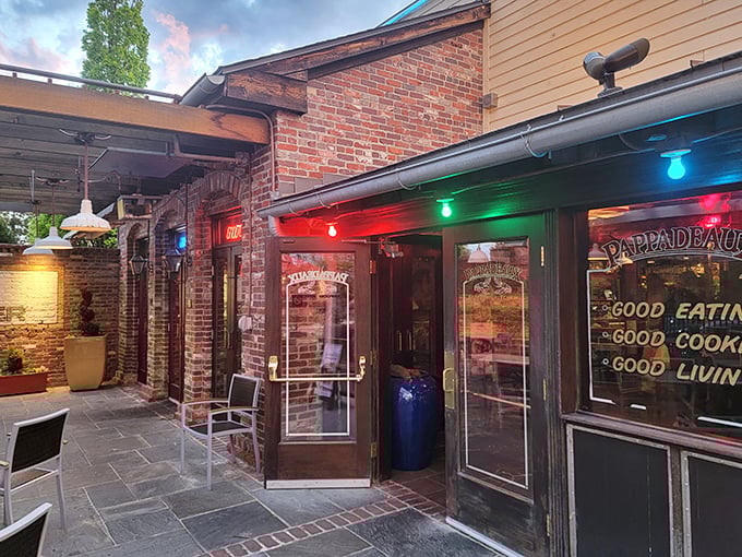 Welcome to seafood paradise! Pappadeaux's exterior promises a feast for the senses, with its inviting brick facade and colorful lights beckoning you inside.