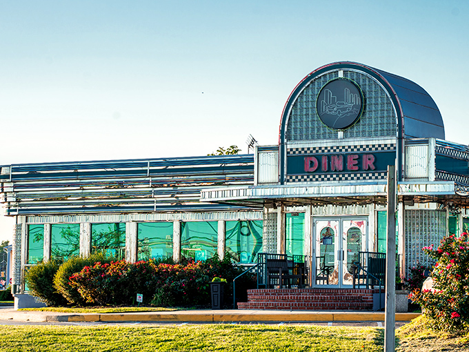 Shiny and chrome, this diner gleams like a time-traveling DeLorean. Step inside for a journey back to the golden age of comfort food and endless coffee refills.