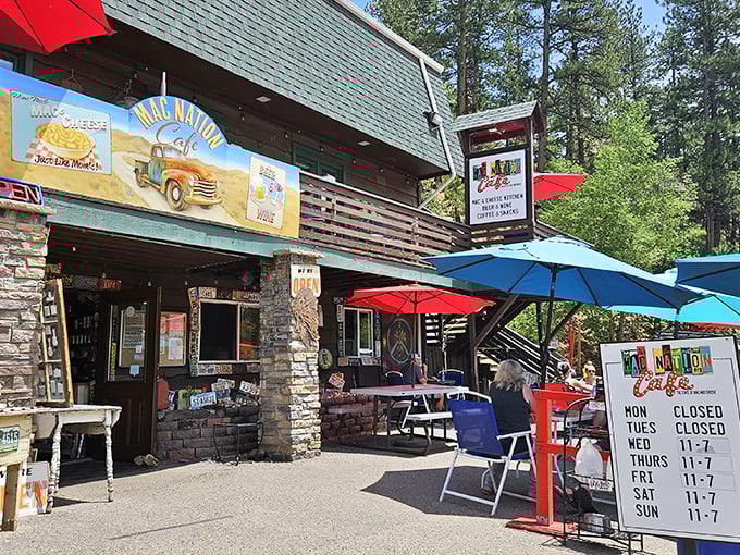 A cheesy oasis in the pines! Mac Nation Cafe's rustic exterior beckons comfort food lovers with the promise of gooey goodness and mountain charm.