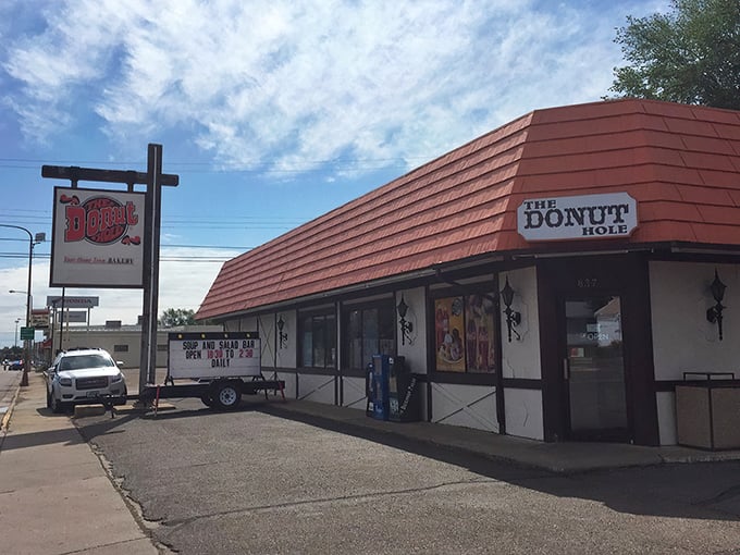 A red-roofed oasis in the heart of Dickinson, The Donut Hole beckons with promises of sugary bliss. It's like finding Willy Wonka's factory, but with more sprinkles and less singing.