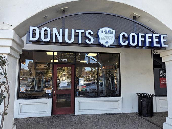 Welcome to donut nirvana! JD Flannel's storefront promises a world of sweet delights, beckoning you like a siren's call to carb-lovers everywhere.