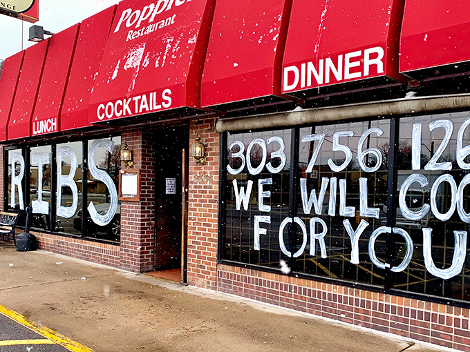 The iconic red awning of Poppies stands out like a beacon for hungry souls on South Colorado Boulevard, promising comfort and satisfaction within.