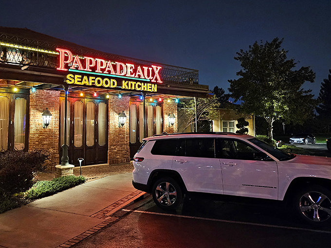 Welcome to seafood paradise! Pappadeaux's exterior promises a feast for the senses, with its inviting brick facade and colorful lights beckoning you inside.