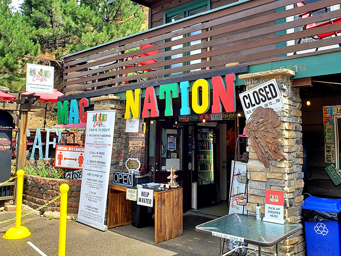A cheesy oasis in the pines! Mac Nation Cafe's rustic exterior beckons comfort food lovers with the promise of gooey goodness and mountain charm.