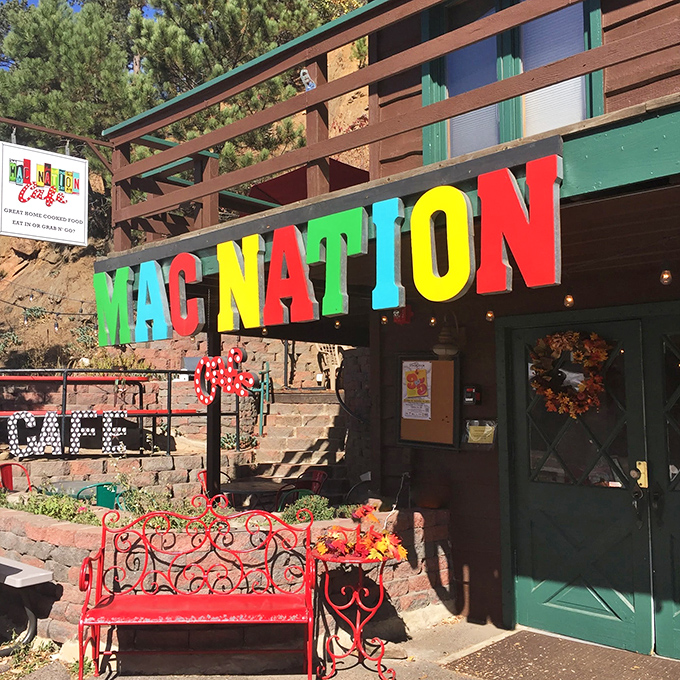 A cheesy oasis in the pines! Mac Nation Cafe's rustic exterior beckons comfort food lovers with the promise of gooey goodness and mountain charm.