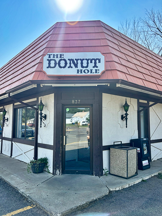A red-roofed oasis in the heart of Dickinson, The Donut Hole beckons with promises of sugary bliss. It's like finding Willy Wonka's factory, but with more sprinkles and less singing.
