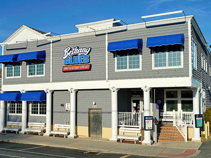 The blue-shingled beacon of BBQ excellence stands proud on Coastal Highway, its classic beach architecture promising smoky delights within these Delaware shores.
