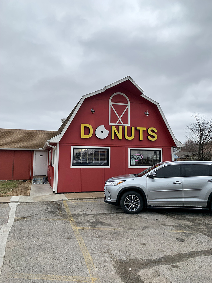 The iconic red barn stands proudly against the Arkansas sky, a beacon of breakfast bliss that practically screams "donuts happen here!"