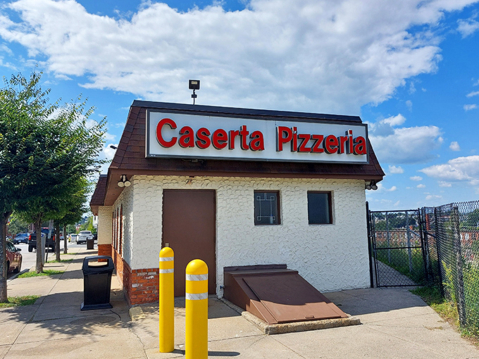 A slice of heaven on Spruce Street! Caserta Pizzeria's unassuming exterior hides a world of flavor within, like a culinary TARDIS for pizza lovers.