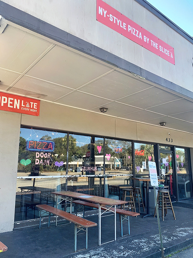 Welcome to pizza paradise! Benny Palmetto's exterior promises New York-style slices that'll transport you faster than a subway ride to Manhattan. 