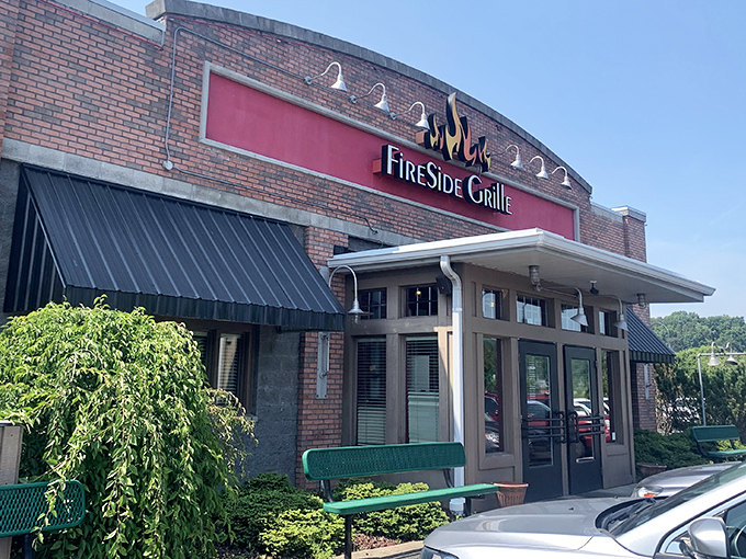 The brick facade with its flame-adorned sign promises warmth before you even step inside. FireSide Grille doesn't need neon to announce its culinary treasures.