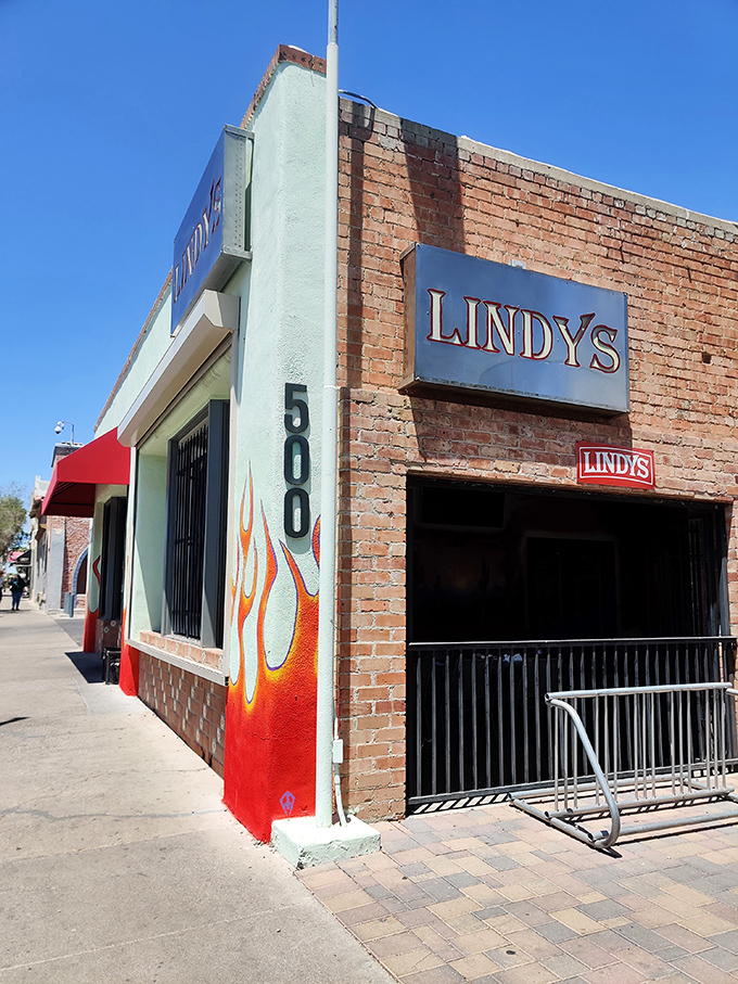 Flame on! Lindy's exterior is a siren call to burger lovers, with its fiery decor and bold promise of "Best Burgers on the Avenue."