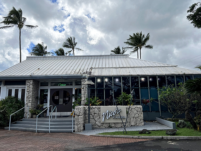 Welcome to flavor paradise! Nico's Kailua's entrance is like a portal to deliciousness, complete with tropical plants and island charm.