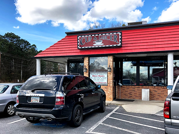 Welcome to flavor town! The Cup & Saucer's retro sign promises a journey back to the golden age of diners.