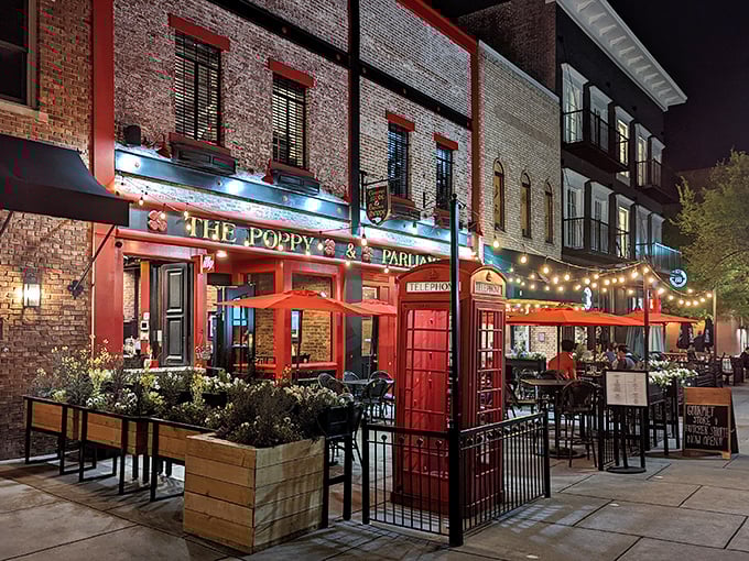 A splash of British charm in the heart of Huntsville! The Poppy & Parliament's vibrant red facade and twinkling lights beckon you to step into a world of culinary adventure.