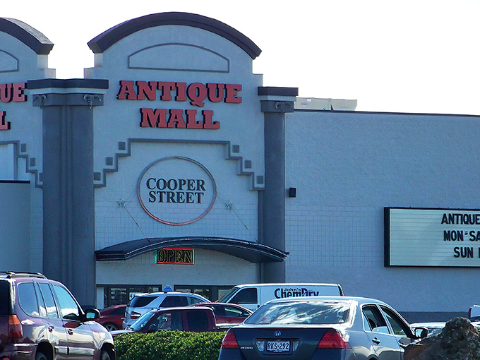 Welcome to the time machine! This isn't just any old store front - it's a portal to the past, beckoning you with its bold red letters and promise of treasures within.