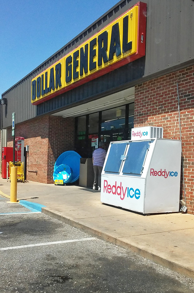 Welcome to the land of endless possibilities! This Dollar General's bright yellow sign is like a beacon of hope for bargain hunters everywhere.