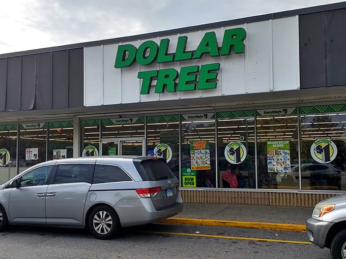 Welcome to the green-and-white palace of thrift! This Dollar Tree's exterior promises a treasure trove of bargains inside, like a modern-day Ali Baba's cave.