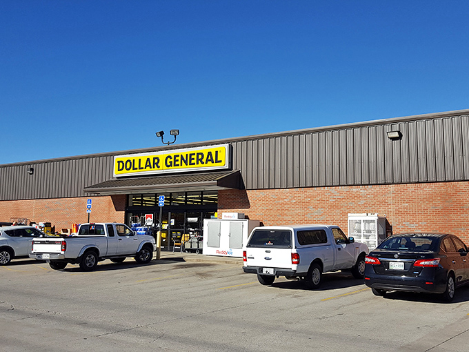 The iconic yellow sign against a clear Tennessee sky&mdash;Dollar General's brick-and-mortar promise of bargains beckons shoppers like a budget-friendly lighthouse.