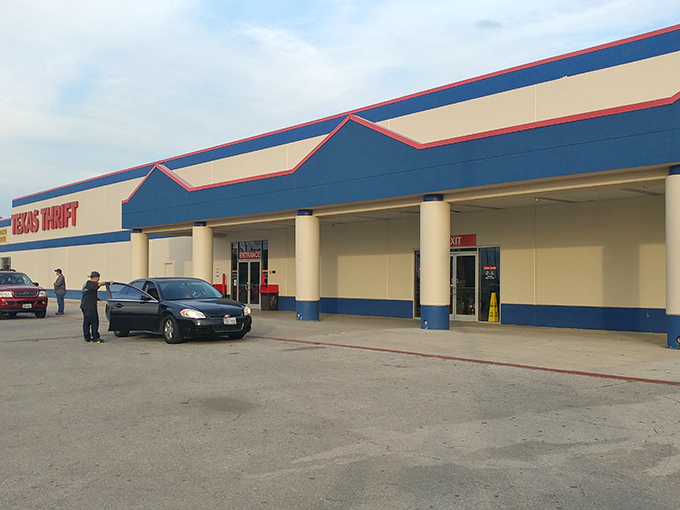 "Now Hiring" - a sign of the times or an invitation to join the treasure hunt? This thrift store's exterior promises adventures in bargain-hunting.