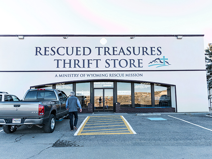 A thrifter's paradise awaits! This clean, white exterior is like a blank canvas, ready to be filled with the colorful stories of treasures inside.