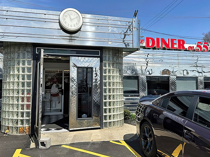 The gleaming stainless steel exterior shines like a beacon of breakfast hope, complete with classic glass block windows and vintage clock.