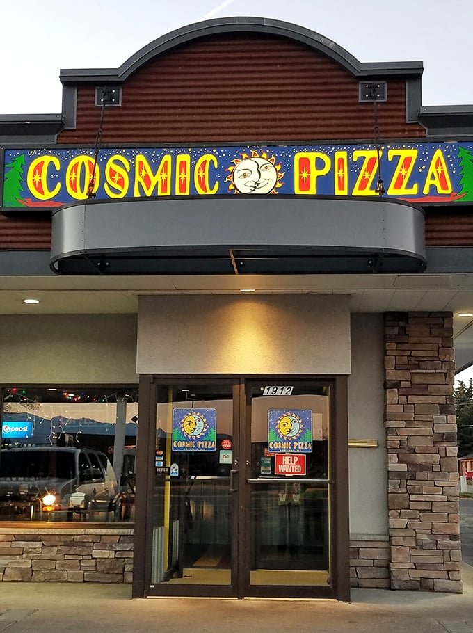 Welcome to the cosmos! Cosmic Pizza's vibrant storefront promises a journey through flavor galaxies far, far away.