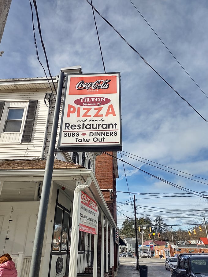 A slice of Americana with a side of pizza! This charming white clapboard building houses Tilton's worst-kept secret - a pizza paradise that's been drawing locals for decades.