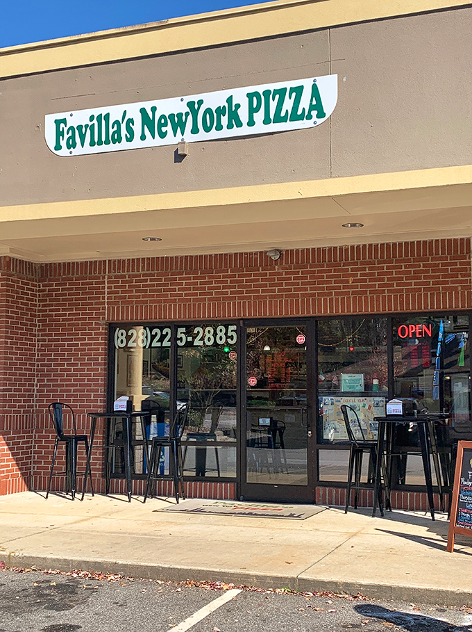A slice of the Big Apple in Asheville! Favilla's neon sign beckons pizza lovers like a lighthouse guiding hungry sailors home.