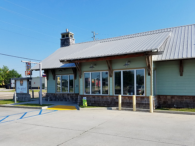 Welcome to Grind Coffee & Nosh, where rustic charm meets culinary delight. This unassuming exterior houses a treasure trove of flavors that'll make your taste buds do a happy dance.