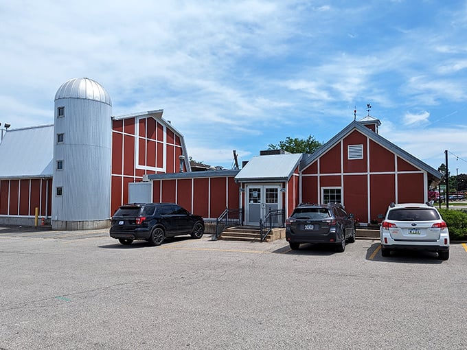 A barn-raising good time! Jimmy Jack's exterior promises a feast with its charming red siding and iconic white silo. It's like a Norman Rockwell painting come to life, but with better ribs.