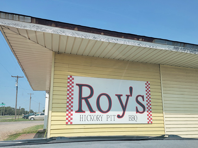 Welcome to BBQ paradise! Roy's Hickory Pit BBQ's sunny exterior promises smoky delights within. It's like finding a pot of gold at the end of a barbecue rainbow.