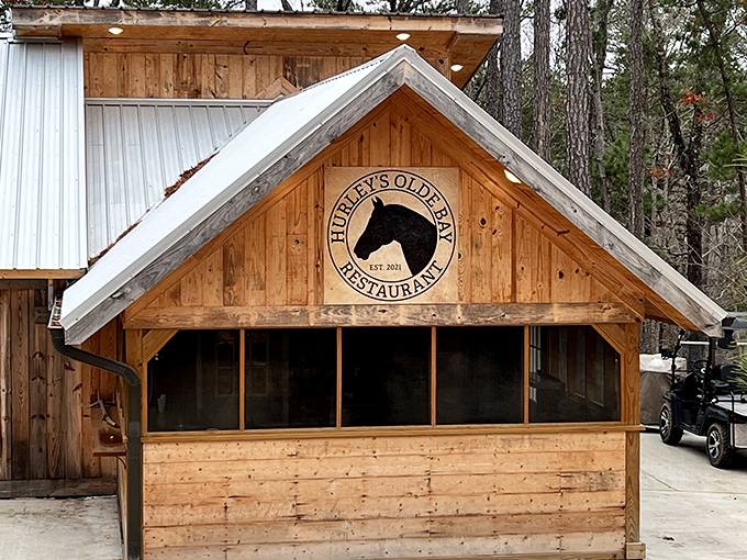 Welcome to Hurley's Olde Bay Restaurant, where rustic charm meets mouthwatering flavors. This wooden wonder looks like it could star in its own country music video!