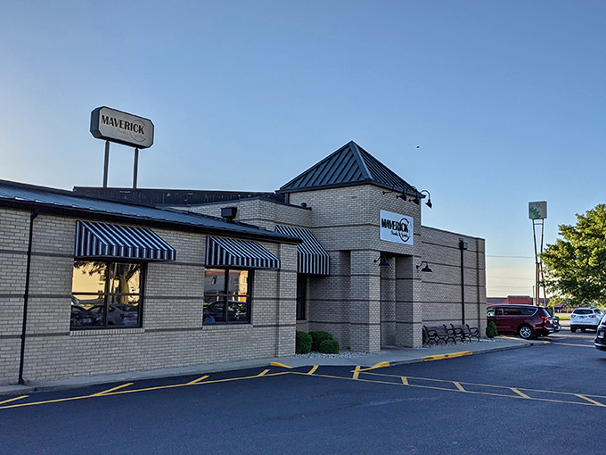Welcome to Maverick Steaks & Spirits, where the exterior is as inviting as a warm hug from your favorite aunt. This brick facade promises meaty delights within!