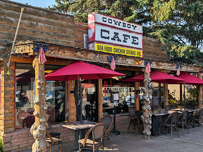 Step into a time machine disguised as a cafe! The Cowboy Cafe's rustic charm and vibrant red umbrellas beckon you to saddle up for a taste of the Wild West.