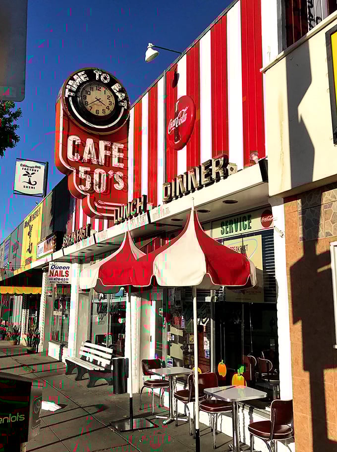 Step into a time warp! Cafe 50's exterior is a red-and-white striped wonderland that'll make you wonder if your DeLorean just hit 88 mph.