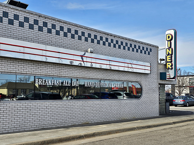 Step back in time! Jimmie's Diner's retro exterior is like a beacon for hungry time travelers, promising a feast of nostalgia and comfort food.