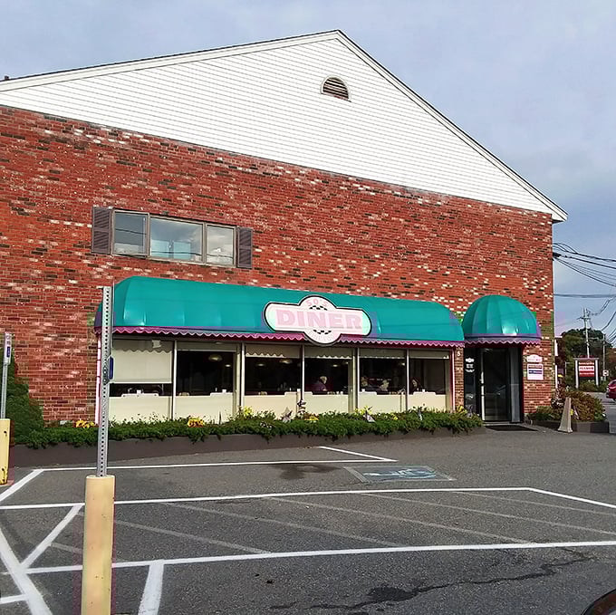 Welcome to the 50's Diner, where nostalgia comes with a side of teal awnings and brick-wall charm. This time capsule of culinary delight is ready to transport you back to the era of sock hops and soda fountains.