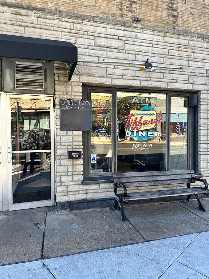 A beacon of comfort food! Tiffany's Original Diner stands proud, its neon sign a siren call to hungry souls seeking solace in syrup-soaked waffles and bottomless cups of joe.