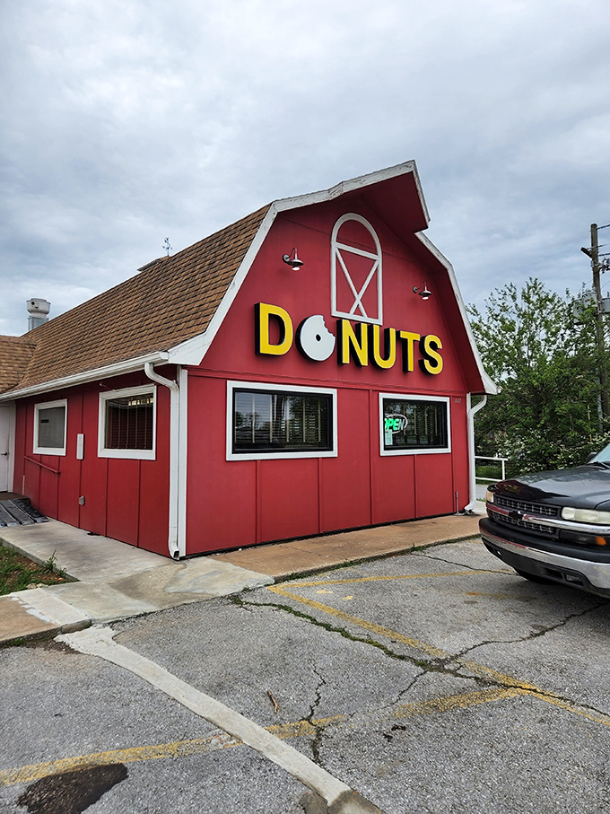The iconic red barn stands proudly against the Arkansas sky, a beacon of breakfast bliss that practically screams "donuts happen here!"