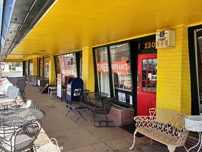Sunshine on a storefront! MacAlpine's yellow exterior is like a beacon of retro joy, beckoning you to step back in time and indulge in some classic Americana.