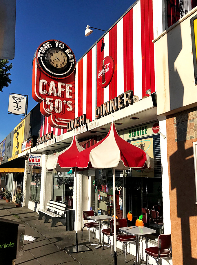 Step into a time warp! Cafe 50's exterior is a red-and-white striped wonderland that'll make you wonder if your DeLorean just hit 88 mph.