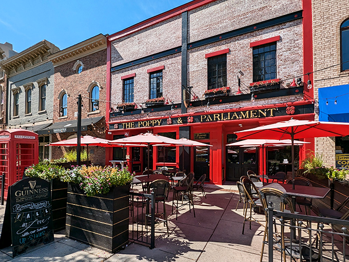 A splash of British charm in the heart of Huntsville! The Poppy & Parliament's vibrant red facade and twinkling lights beckon you to step into a world of culinary adventure.