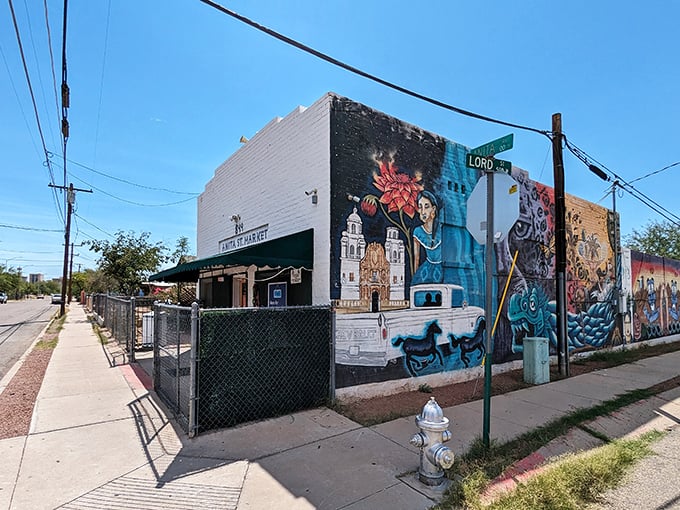 Mural magic! This vibrant street art isn't just eye candy – it's your appetizer for the flavor fiesta waiting inside Anita Street Market. Talk about a colorful welcome!