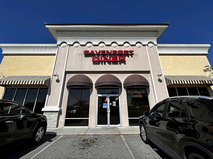 Welcome to flavor town! The Davenport Diner's exterior promises a feast for the senses, with its inviting awnings and cheerful signage beckoning hungry travelers.