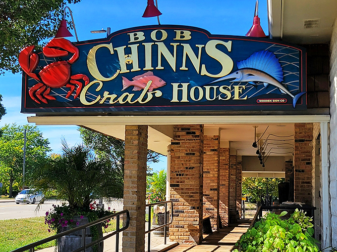 Welcome to seafood paradise! Bob Chinn's Crab House stands proud, its weathered sign a beacon for crustacean enthusiasts and butter lovers alike.