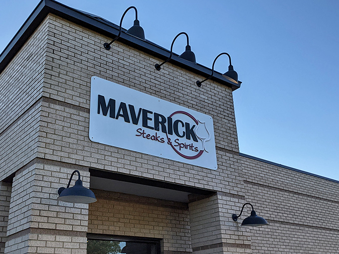 Welcome to Maverick Steaks & Spirits, where the exterior is as inviting as a warm hug from your favorite aunt. This brick facade promises meaty delights within!