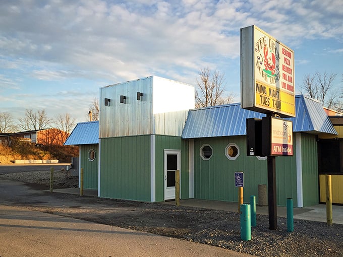 Ahoy, seafood lovers! This mint-green maritime marvel is like a lighthouse for hungry landlubbers, beckoning with promises of oceanic delights.