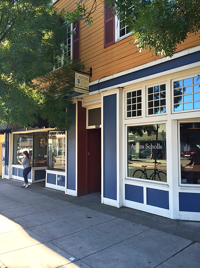 Welcome to pizza paradise! Apizza Scholls' unassuming exterior hides a world of flavor within, proving that great things come in modest packages.