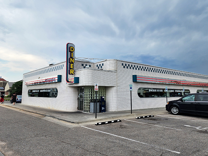 Step back in time! Jimmie's Diner's retro exterior is like a beacon for hungry time travelers, promising a feast of nostalgia and comfort food.